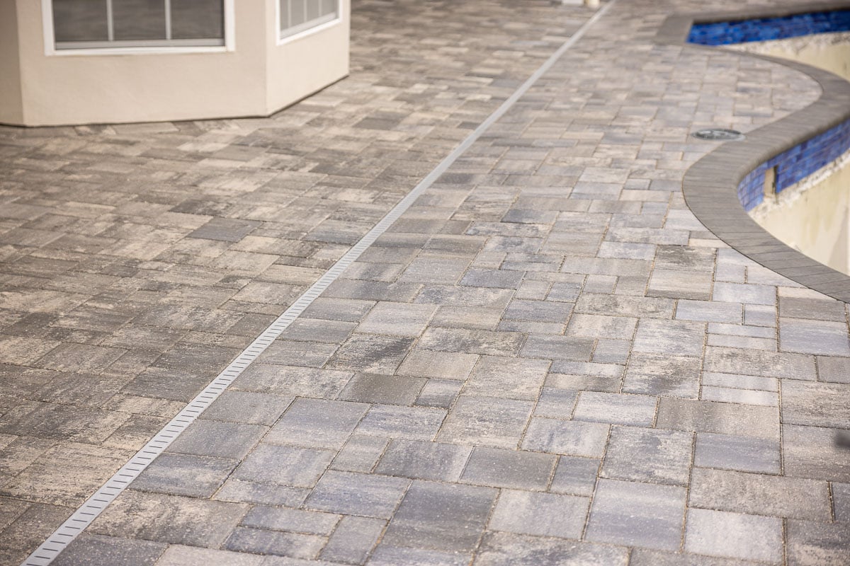 What Are the Best (& Safest) Pavers for Wet Areas in My Orlando Backyard?